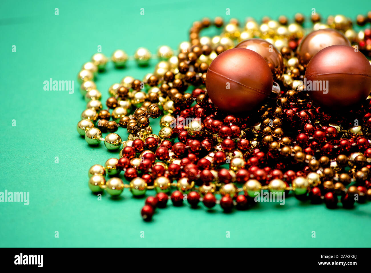 Christmas collection chains with bulbs on green background Stock Photo ...
