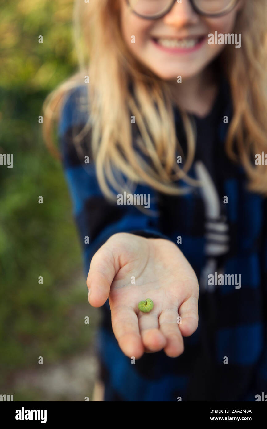 Person holding insect hi-res stock photography and images - Alamy