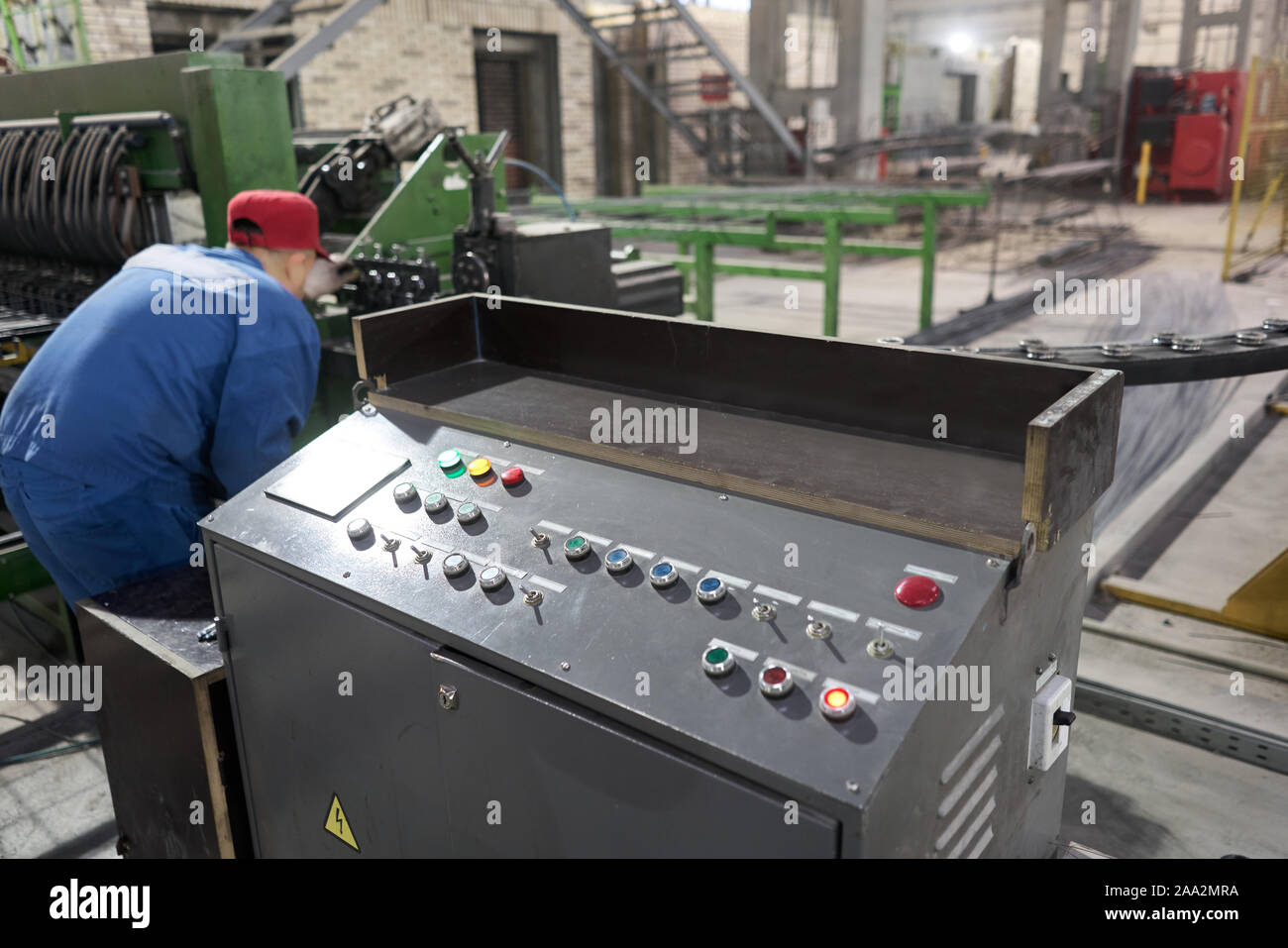 Workers working with metal, welding reinforcement for concrete ...