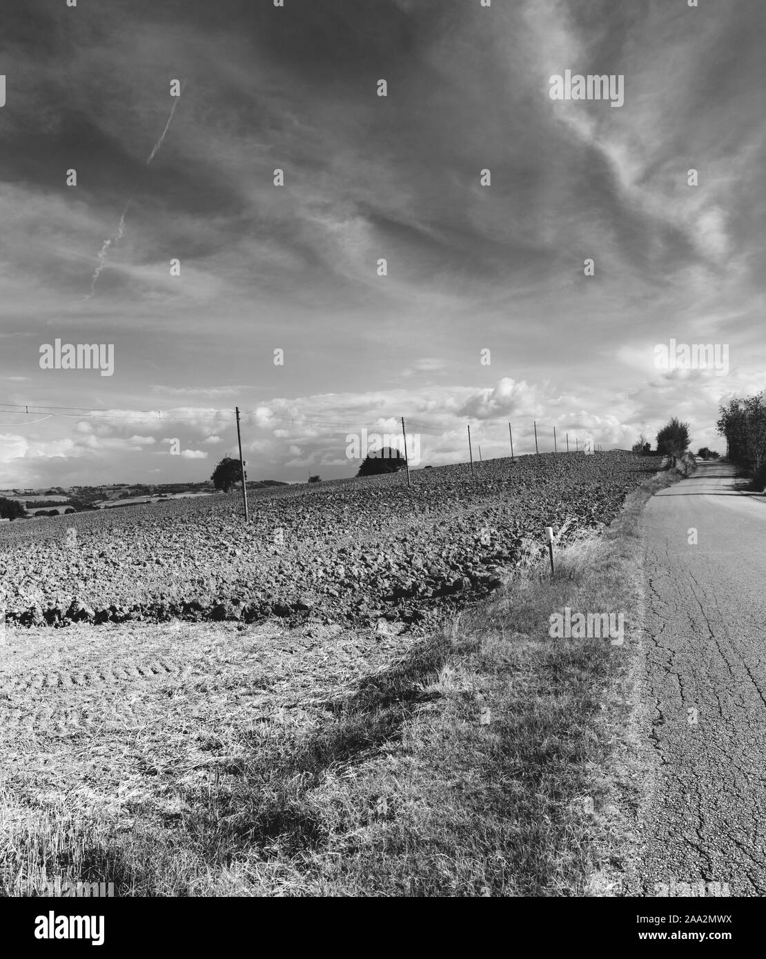 Rural landscape in black and white, country road and cloudy sky Stock ...