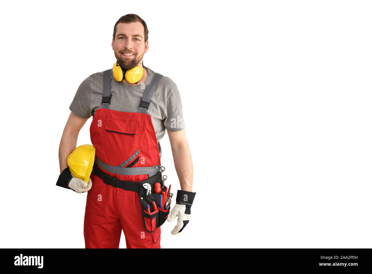 cheerful construction worker - craftsman in work clothes on white ...