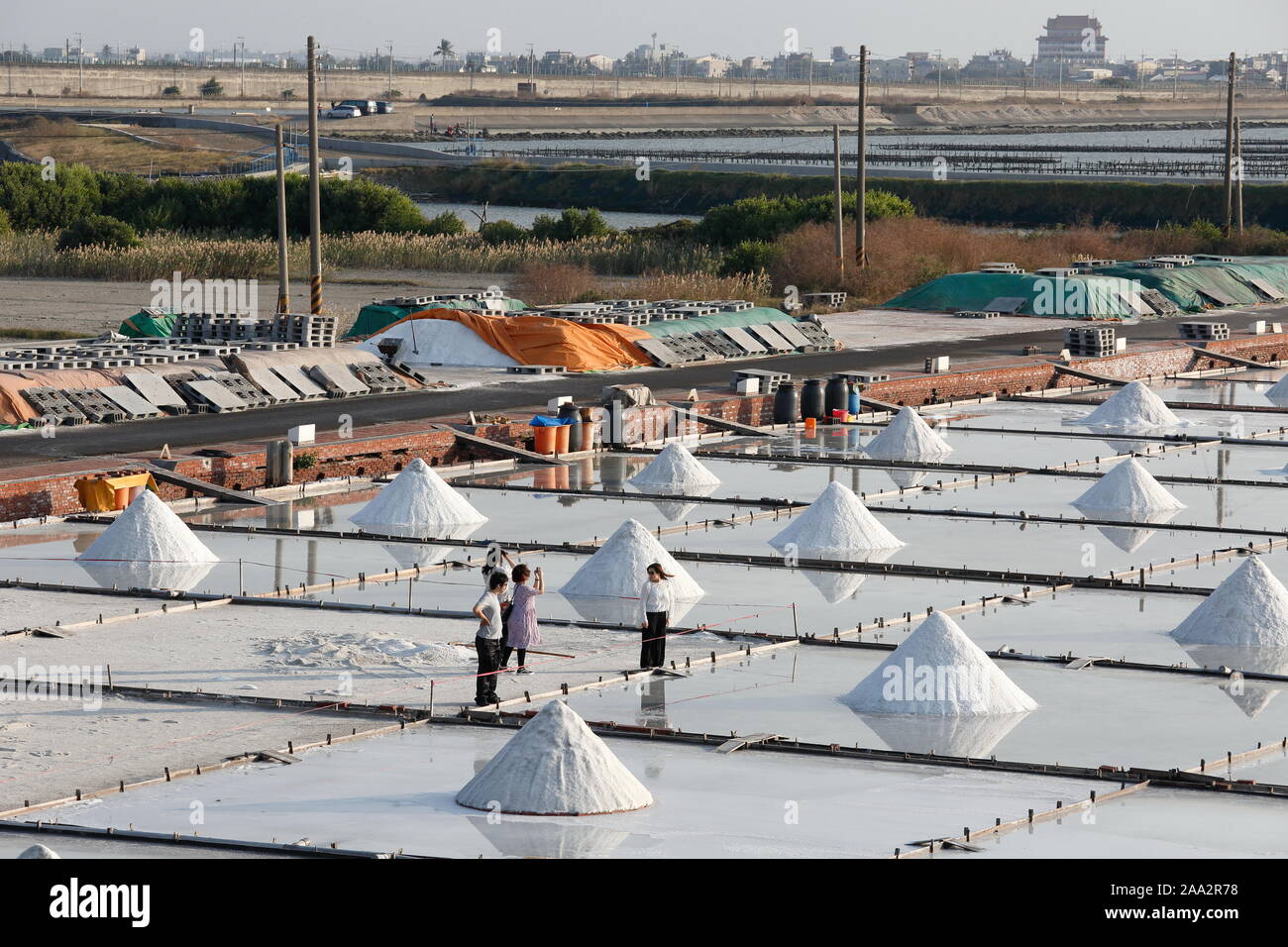 Salt making in Jingzaijiao Tile-paved salt fields Stock Photo - Alamy