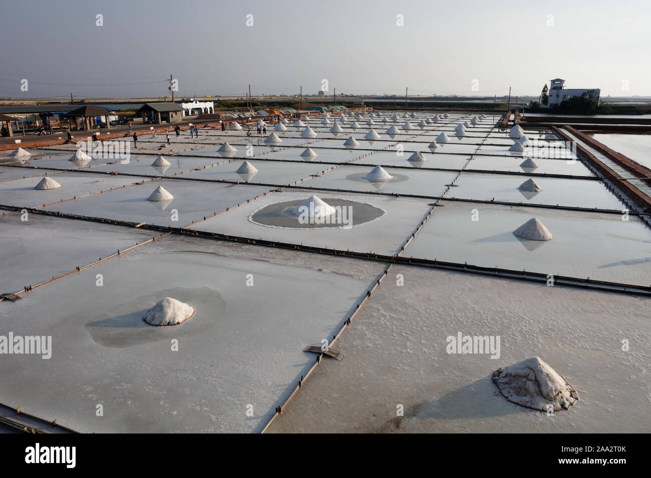 Salt making in Jingzaijiao Tile-paved salt fields Stock Photo - Alamy