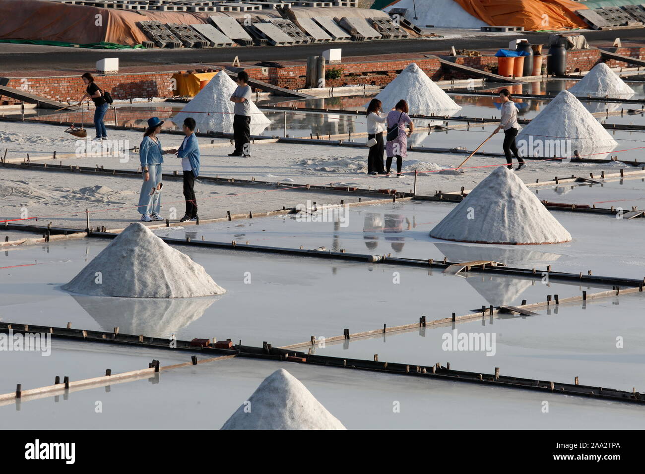 Salt making in Jingzaijiao Tile-paved salt fields Stock Photo - Alamy