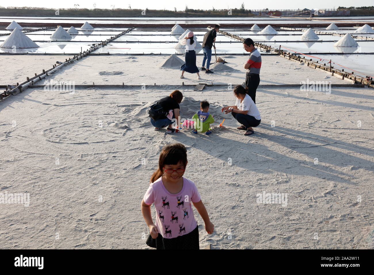 Salt making in Jingzaijiao Tile-paved salt fields Stock Photo - Alamy