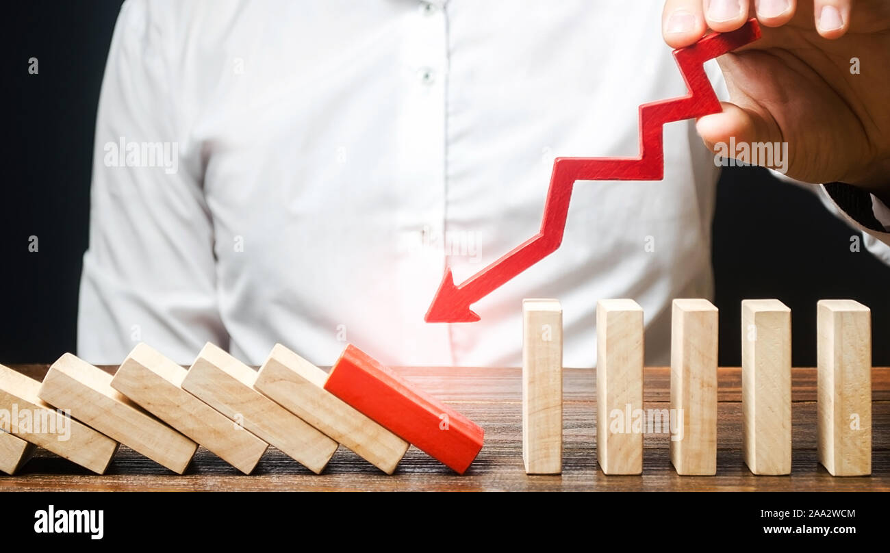 A man starts a chain reaction of falling dominoes. Start running ...