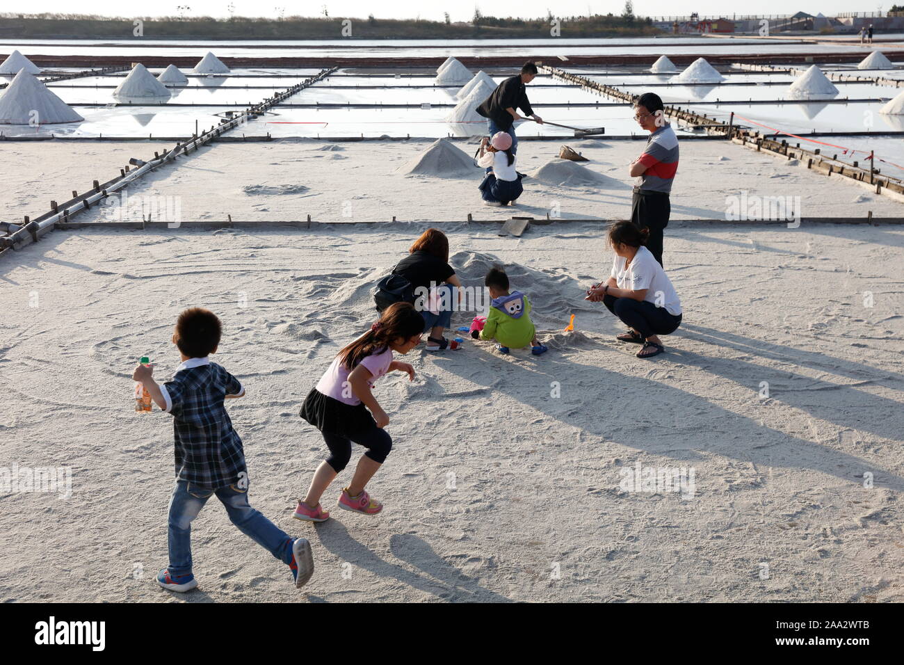 Salt making in Jingzaijiao Tile-paved salt fields Stock Photo - Alamy
