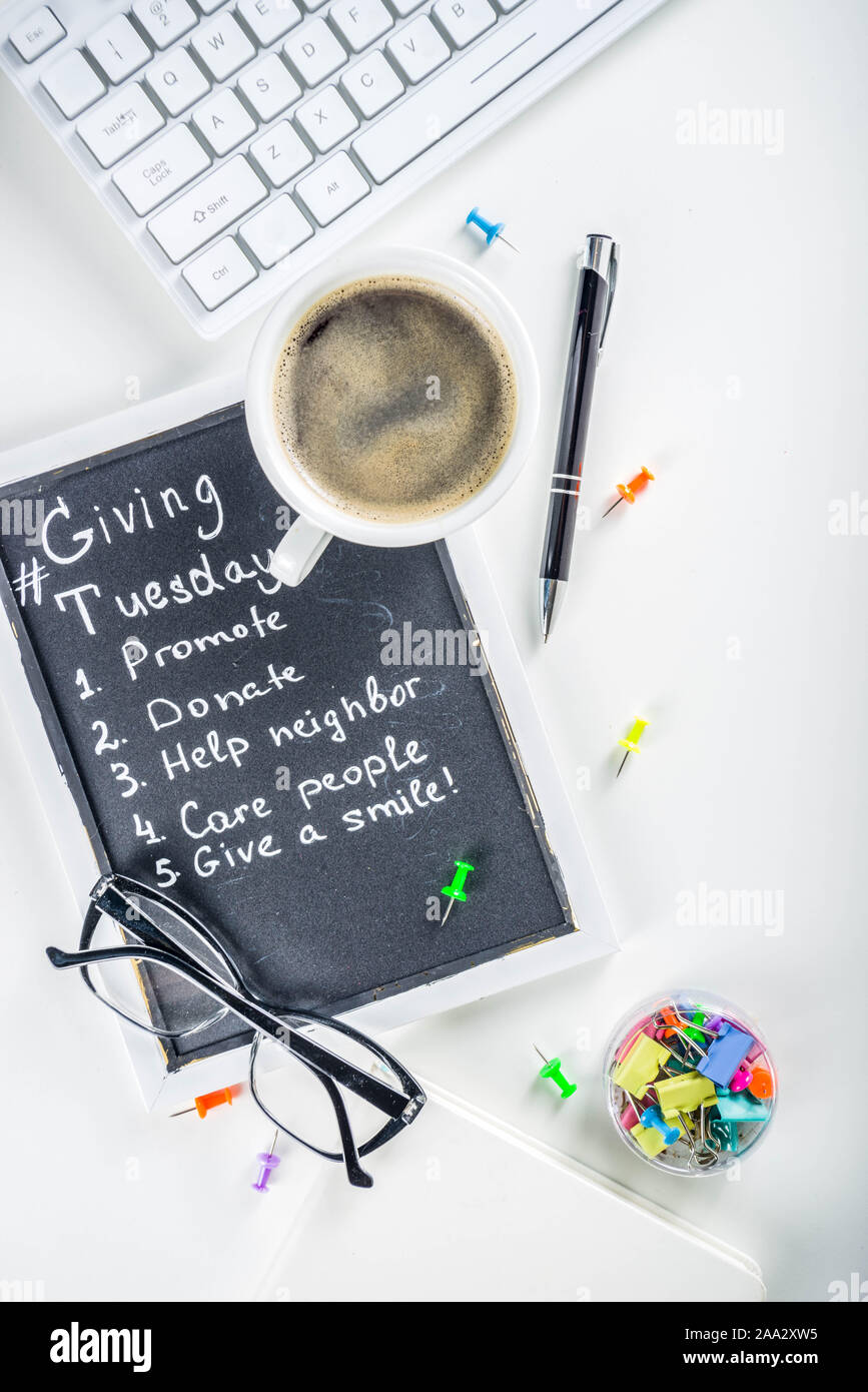 Chalk board with list of tasks, ideas, task for Giving Tuesday. Notes ...