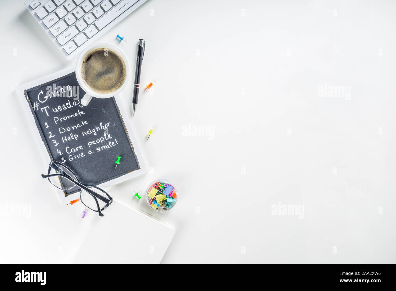 Chalk board with list of tasks, ideas, task for Giving Tuesday. Notes ...
