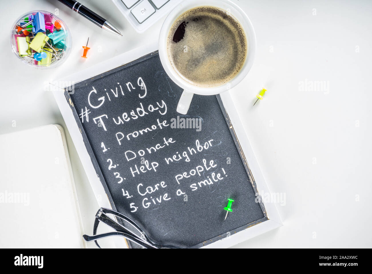 Chalk board with list of tasks, ideas, task for Giving Tuesday. Notes ...