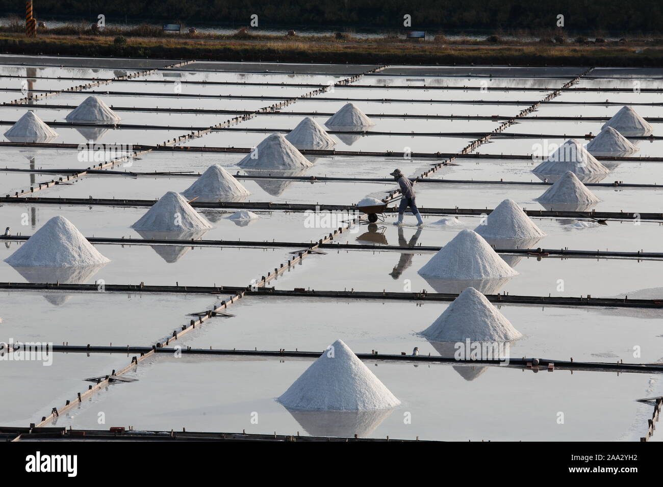 Salt making in Jingzaijiao Tile-paved salt fields Stock Photo - Alamy