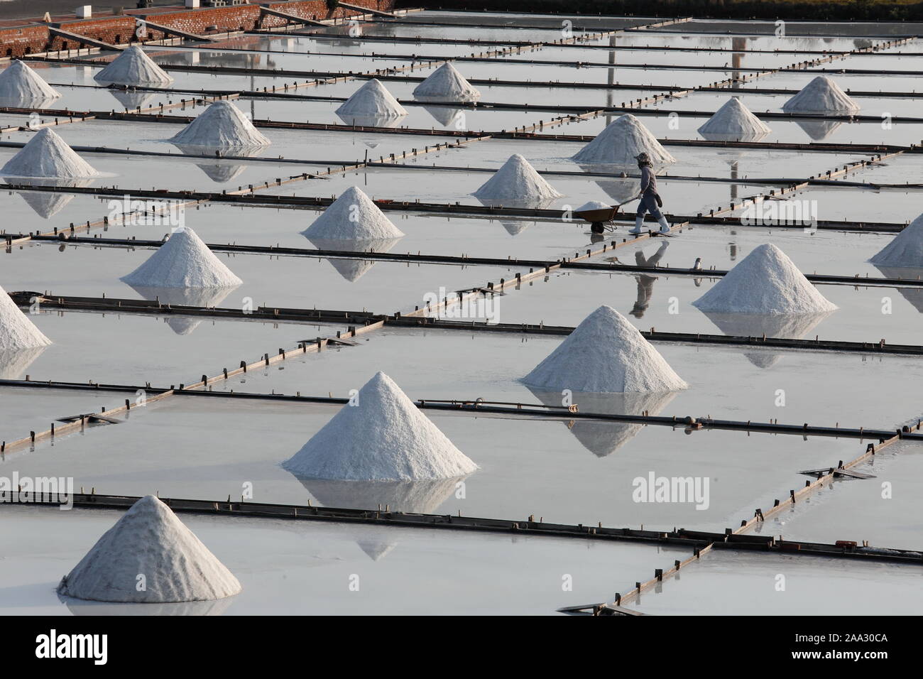 Salt making in Jingzaijiao Tile-paved salt fields Stock Photo - Alamy