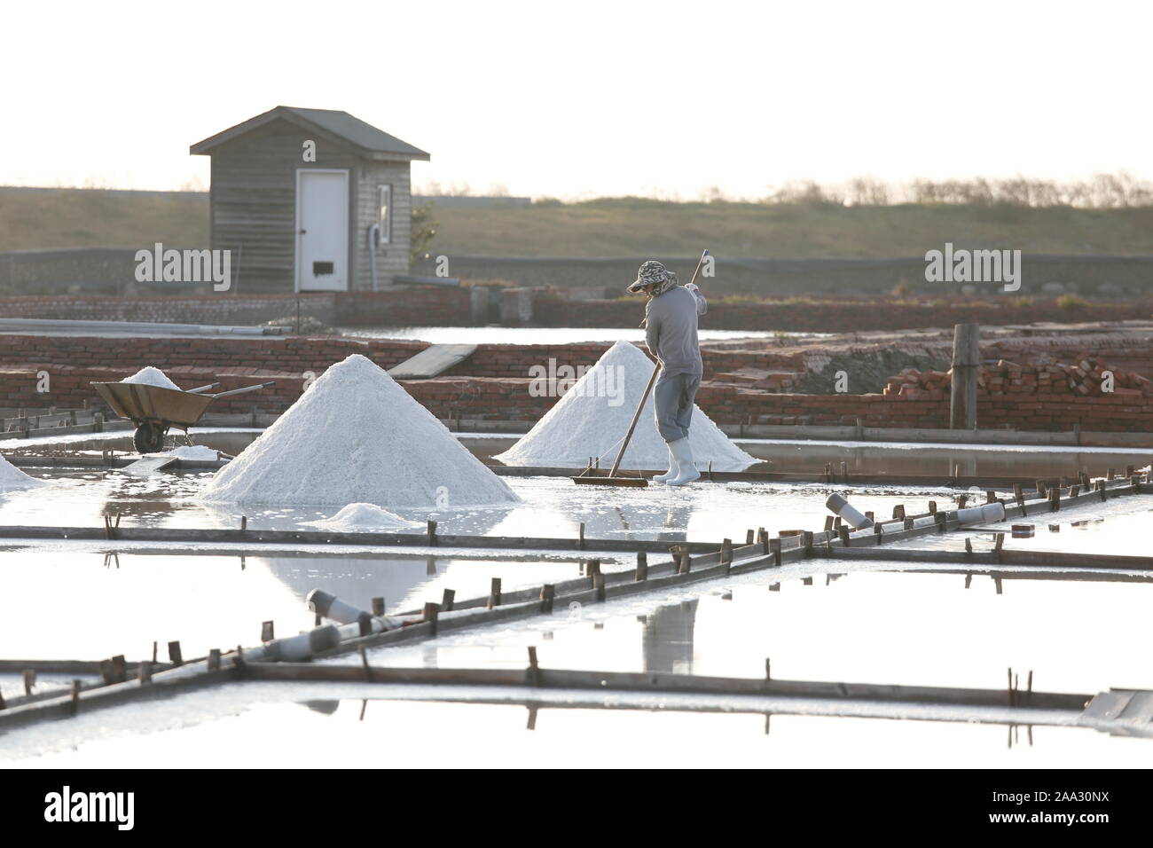 Salt making in Jingzaijiao Tile-paved salt fields Stock Photo - Alamy