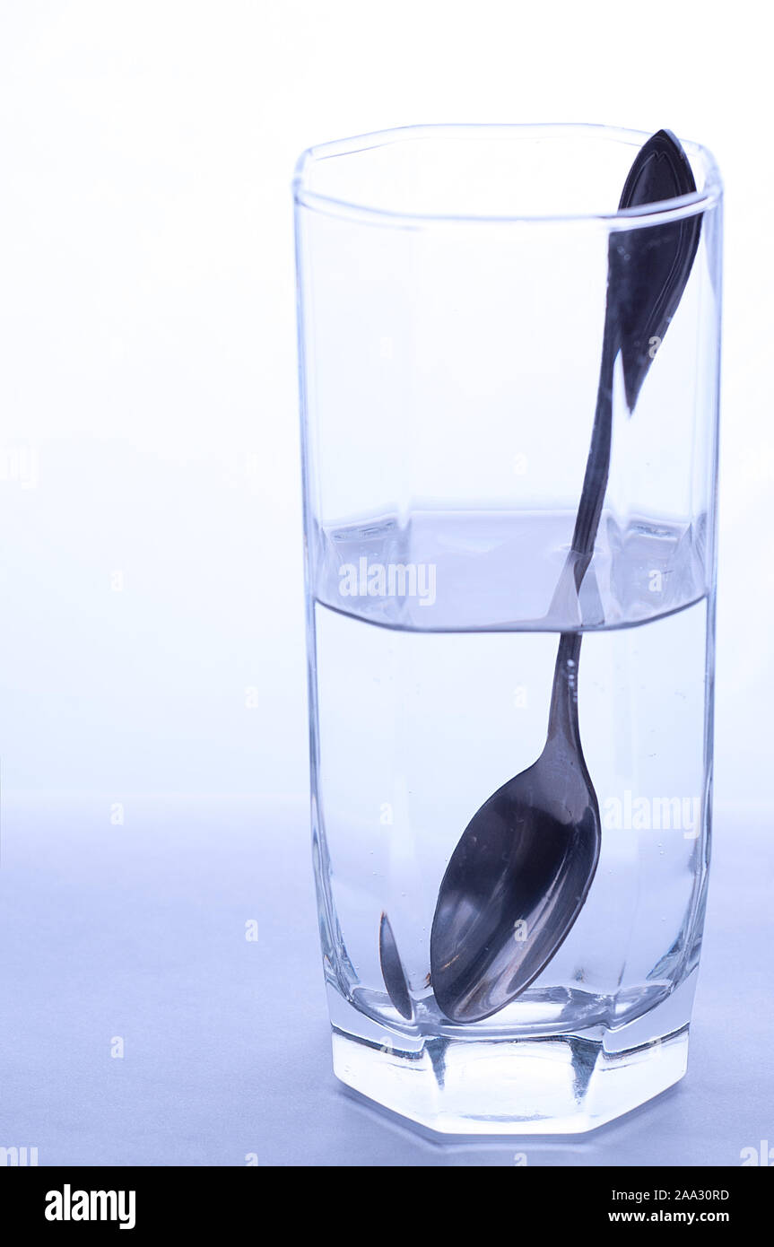 Water refraction spoon hi-res stock photography and images - Alamy
