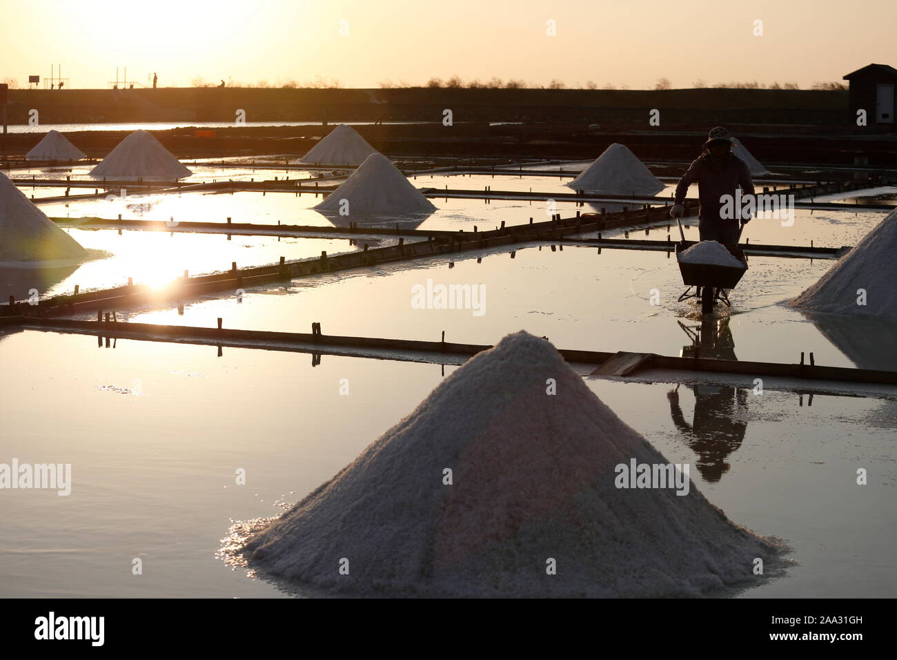 Salt making in Jingzaijiao Tile-paved salt fields Stock Photo - Alamy