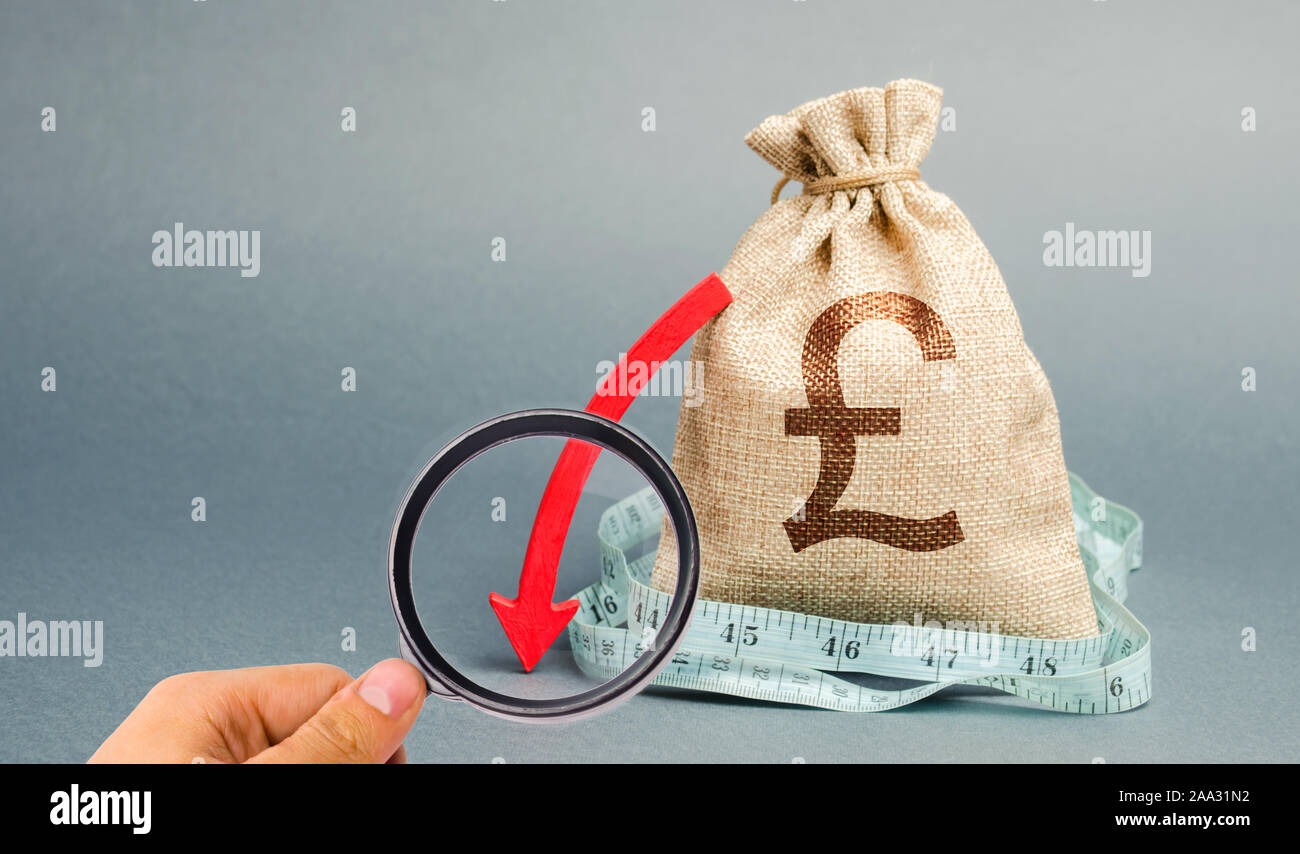Money bag with red arrow down. The concept of reducing profits. Limited ...