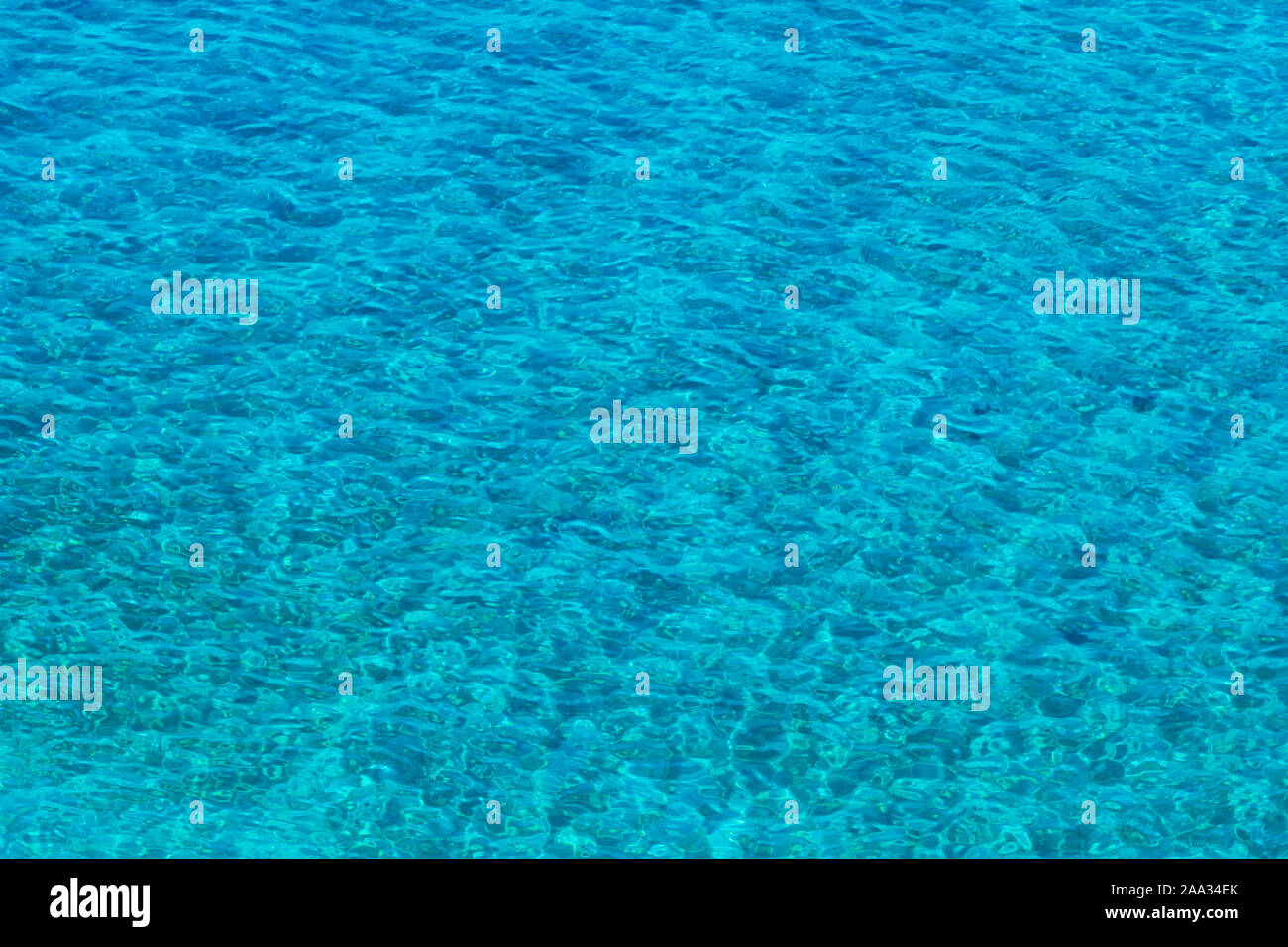 Vibrant blue color surface of sea. Top view on clean sky blue sea water ...