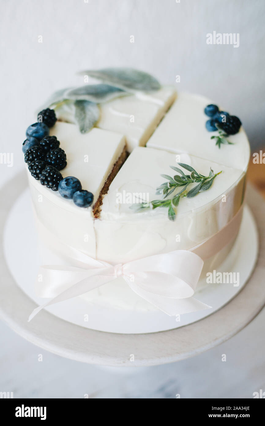 Close-up of four slices of cake tied together to make a compound cake ...