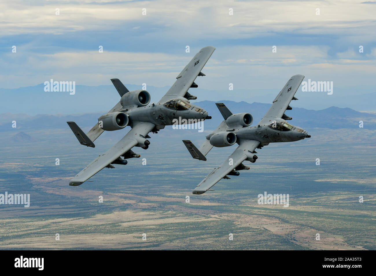 Two A-10 Thunderbolt IIs fly in formation over southern Arizona, April ...