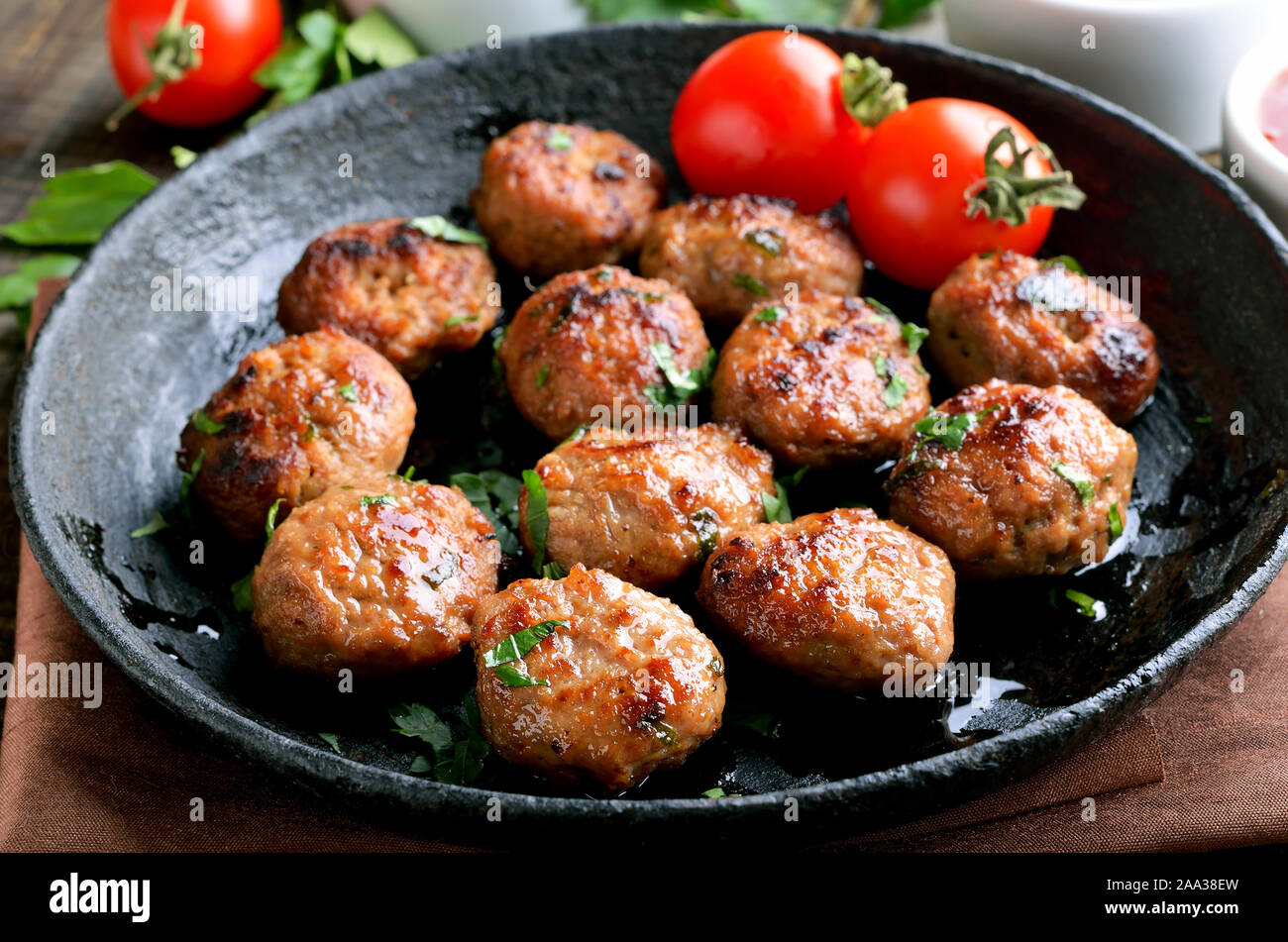 Homemade cutlets from minced meat in frying pan, close up view Stock ...