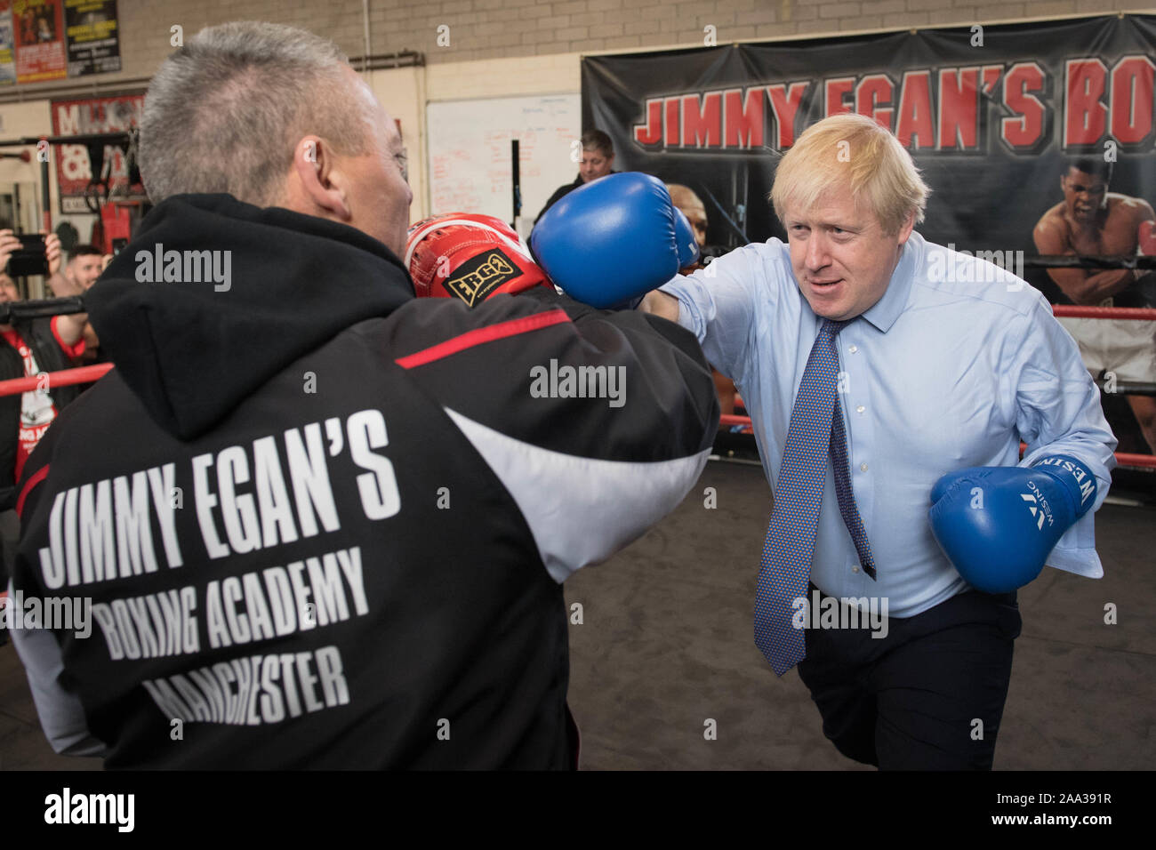 Prime Minister Boris Johnson spars with boxing coach, Steve Egan during ...