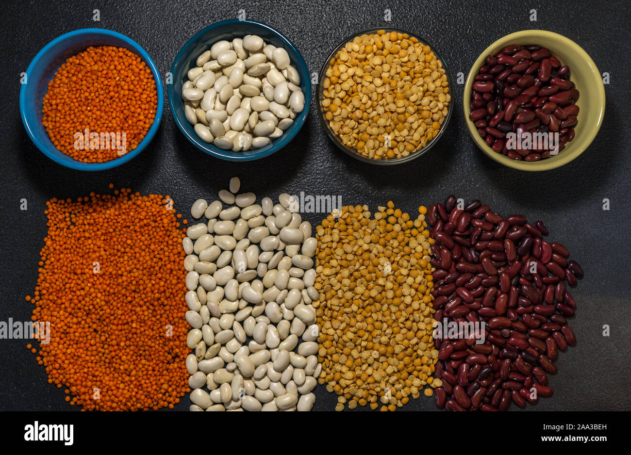 healthy eating vegetarian beans lentils and peas on a dark background ...
