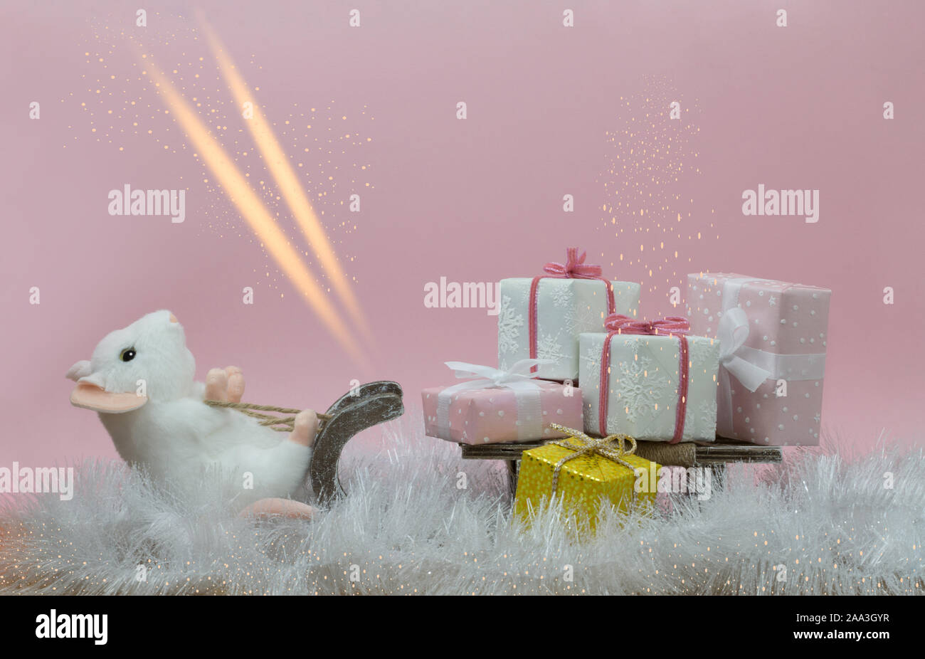 Powerfully, the mouse pulls the heavy, fully loaded sled Stock Photo ...