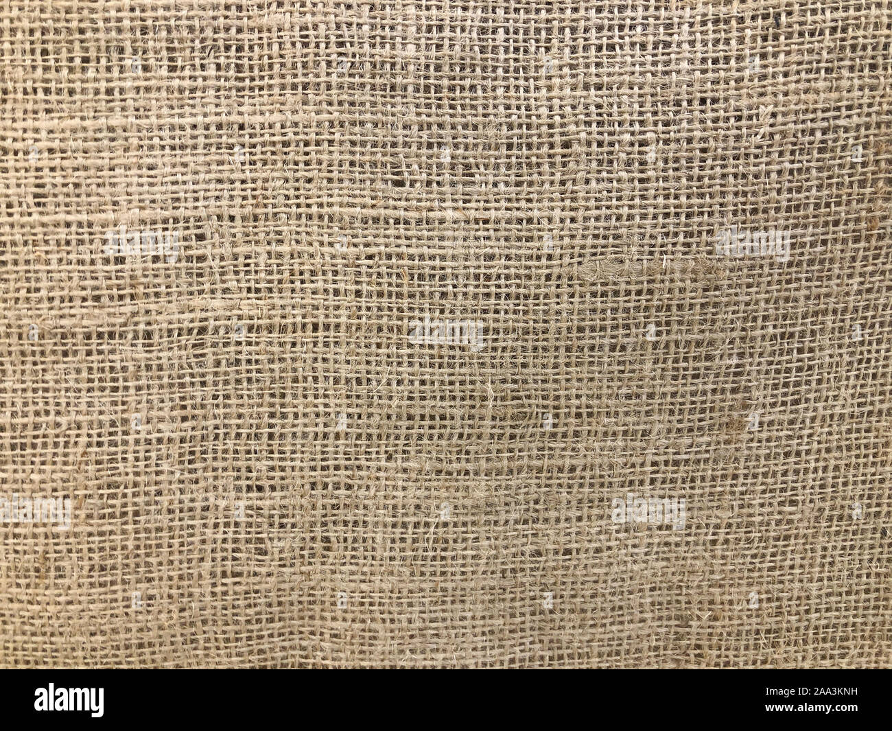 The texture of the natural fabric is burlap, brown. Interior decoration ...