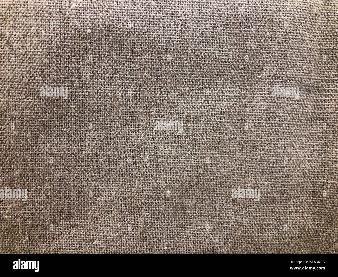 The texture of the natural fabric is burlap, brown. Interior decoration ...