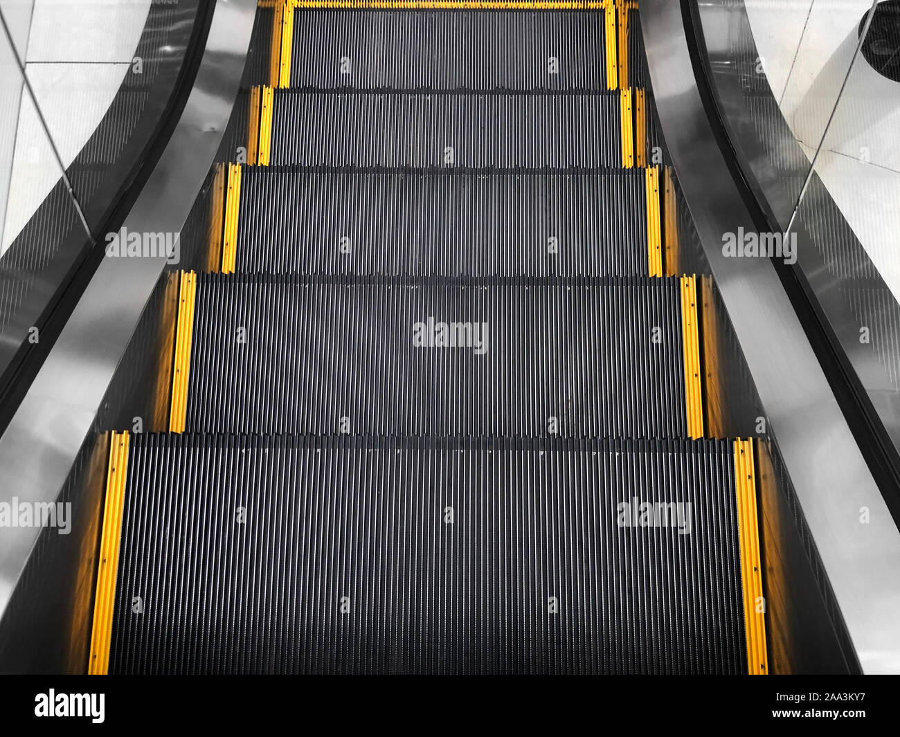Excavator in the supermarket, view from the top. Mechanical ladder with ...