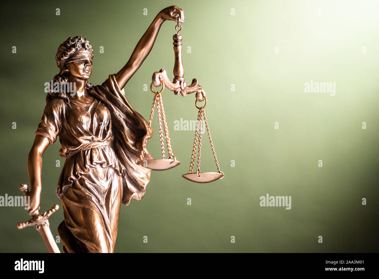 Bronze statue of Justice with sword and scales Stock Photo - Alamy