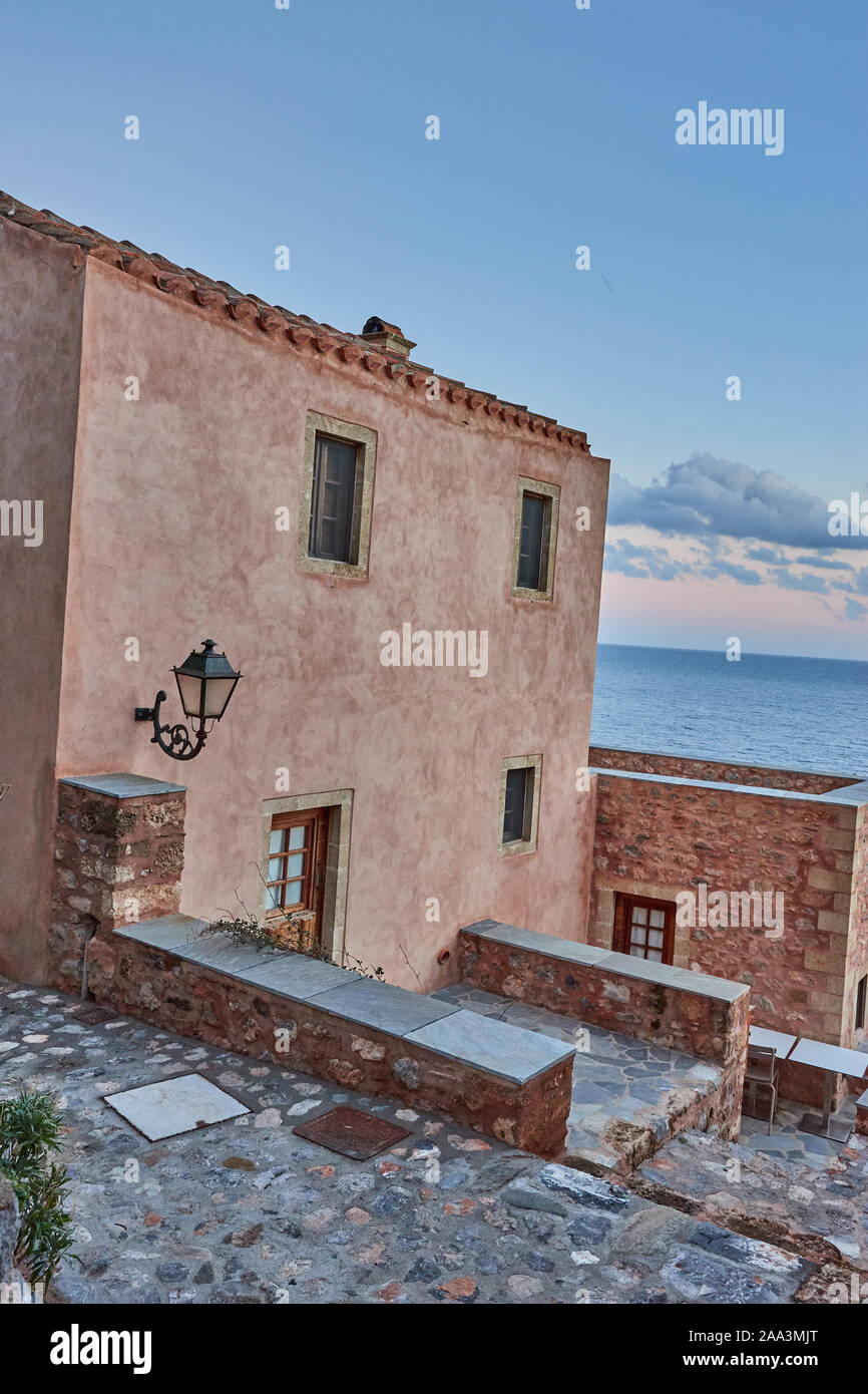Stone alley into the picturesque castle town of Monemvasia during ...