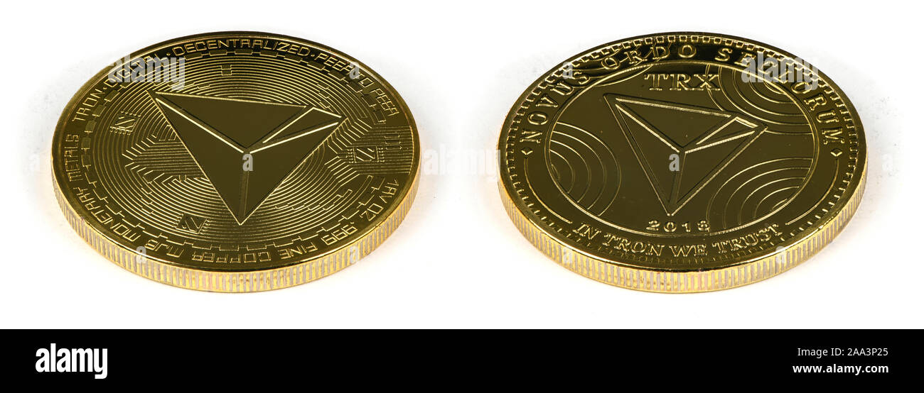 Face and back side of the crypto currency golden tron isolated on white ...