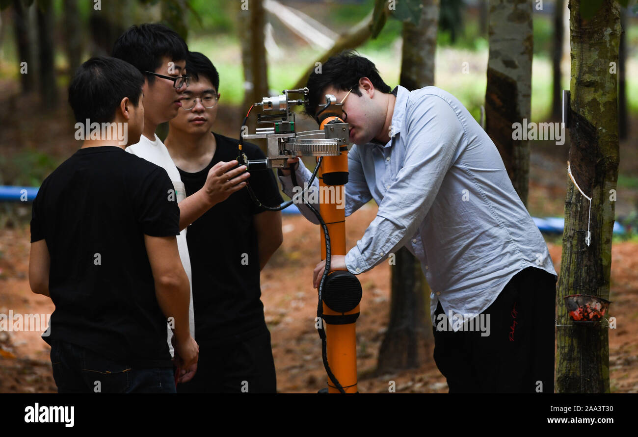 Haikou. 19th Nov, 2019. Research staff check an autonomous rubber ...