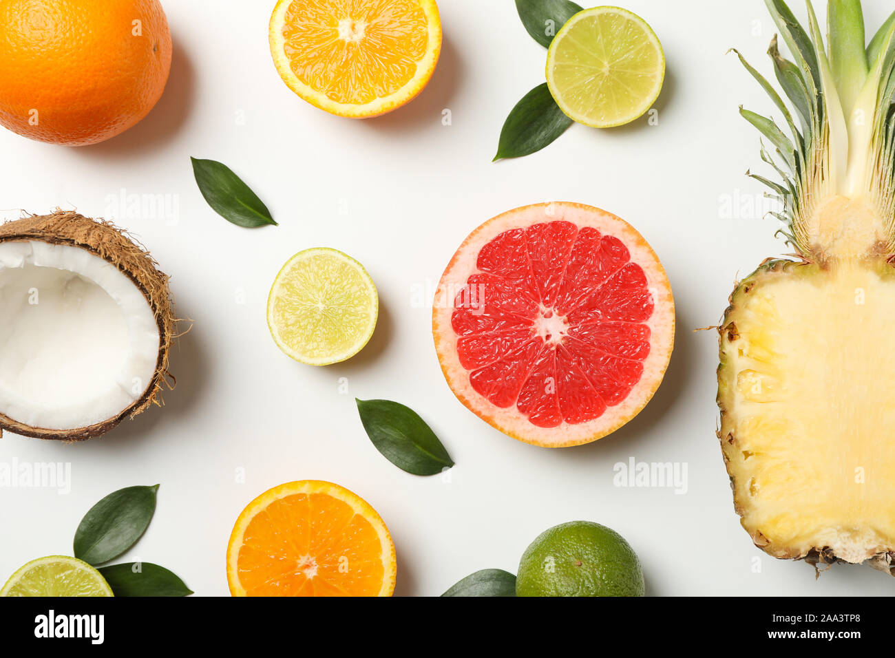 Flat lay with exotic fruits on white background, top view Stock Photo ...