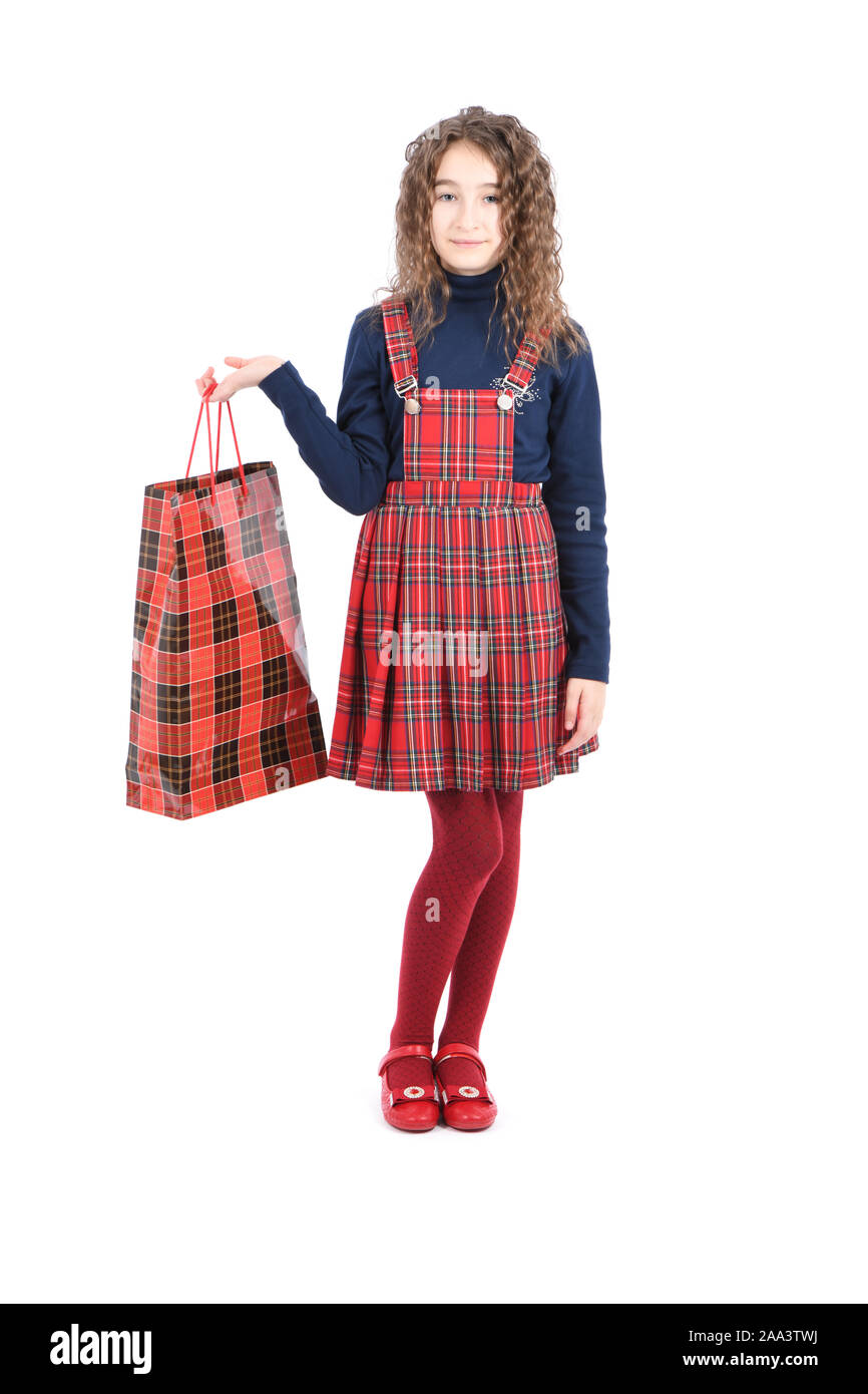 Child with a red packet isolated on white background. Little beauty ...