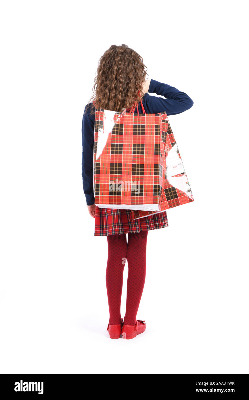 Child with a red packet isolated on white background. Little beauty ...