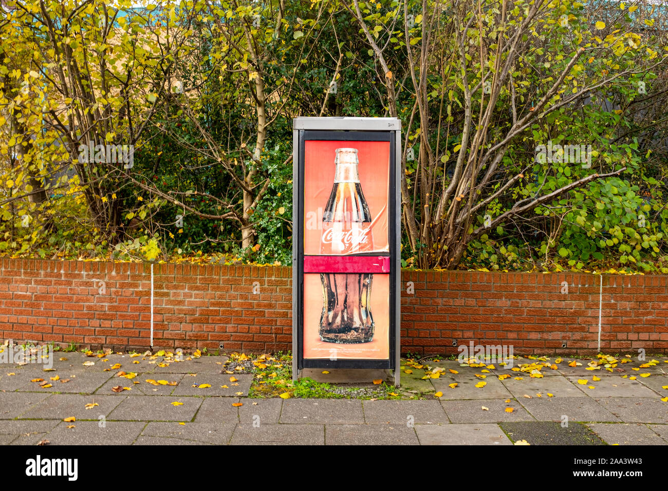 Coca cola advert on BT telephone box UK Stock Photo - Alamy