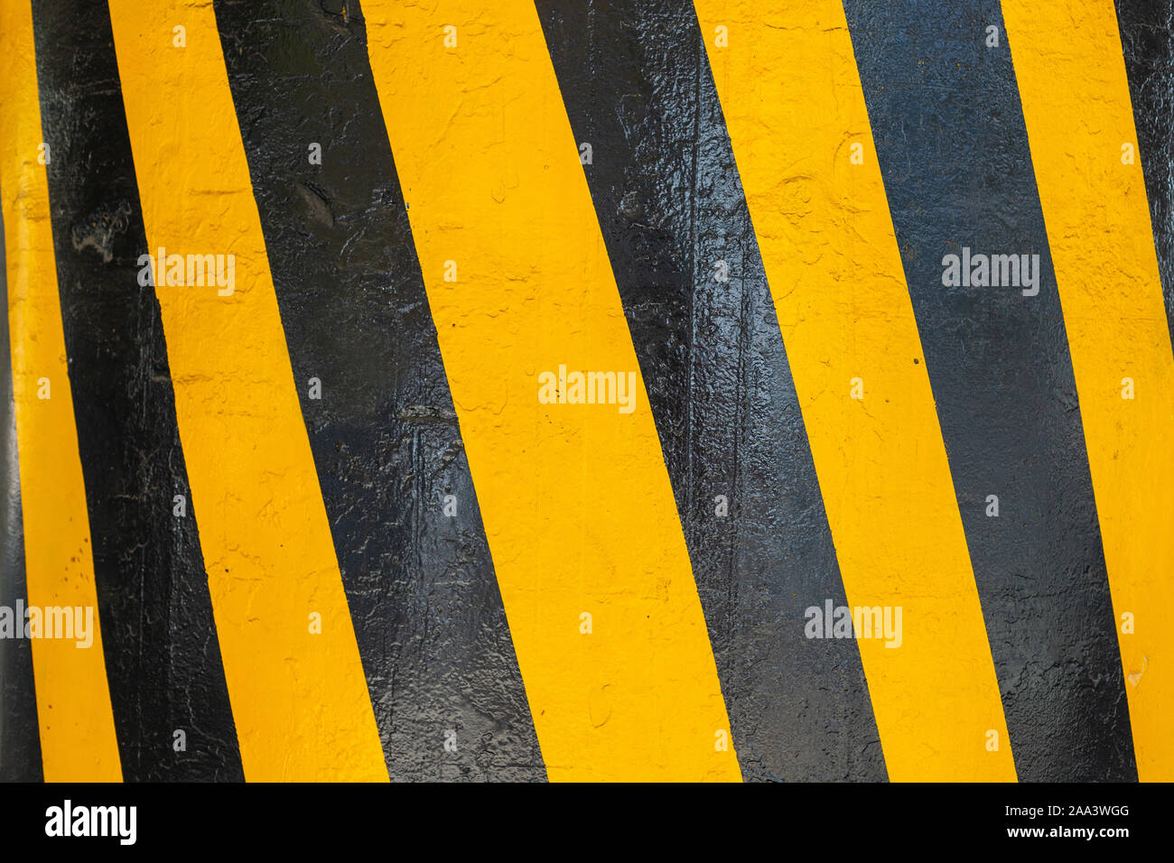Yellow and black stripes diagonally. Warning lines in black and yellow ...
