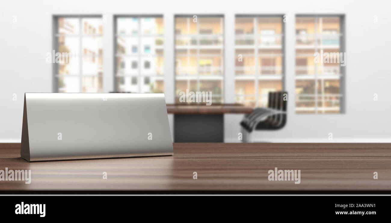 Label blank, metal tent sign template on a wooden desk. Blur business ...