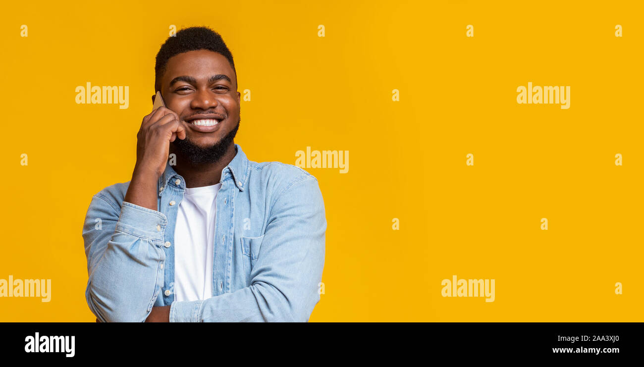 African man smirking hi-res stock photography and images - Alamy