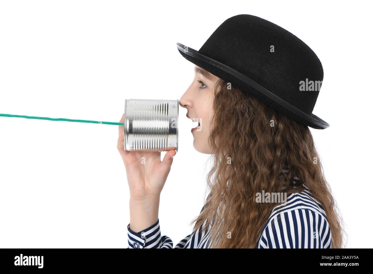 Young girl call by tin can phone isolated on white. High resolution ...