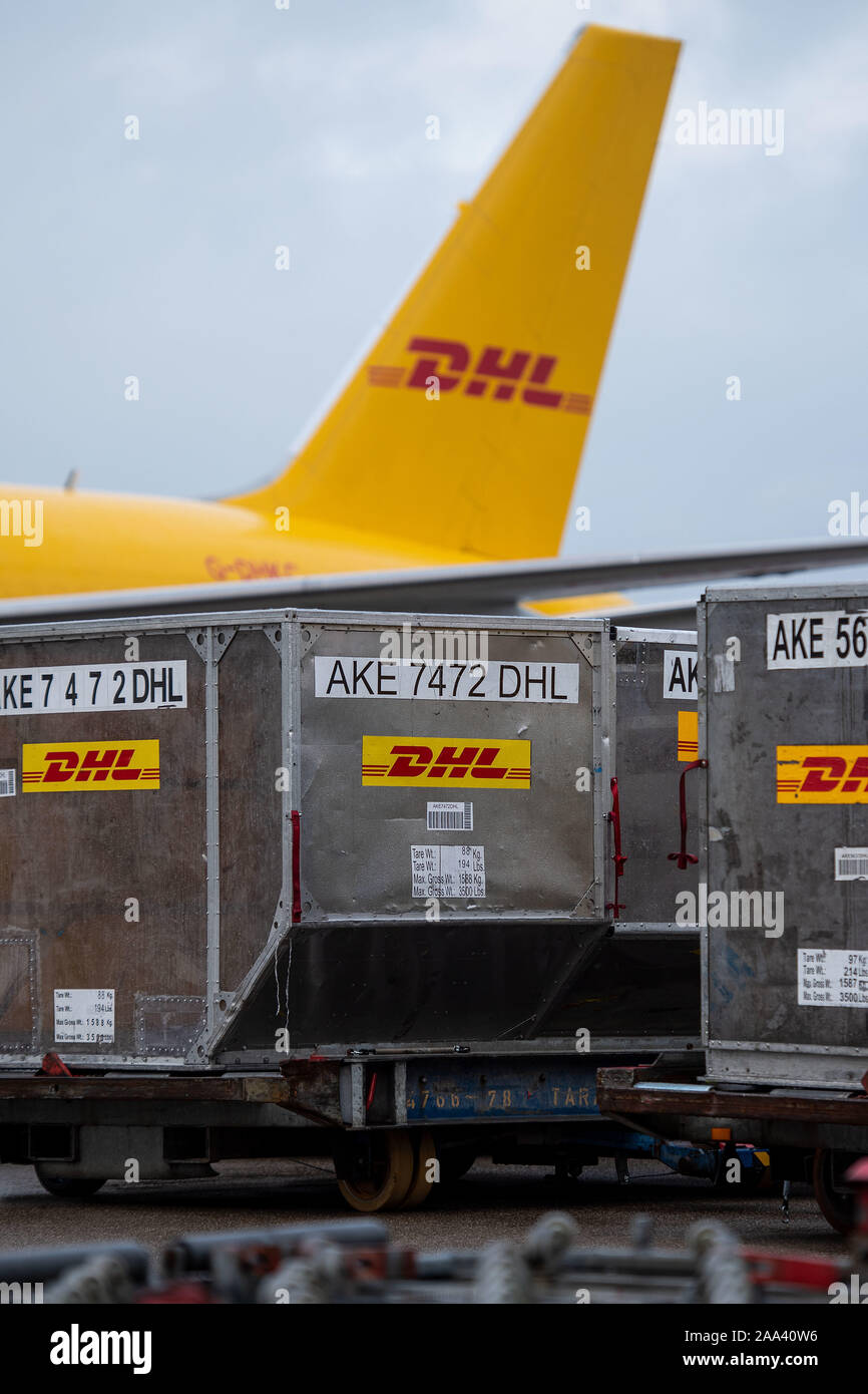 Cologne, Germany. 19th Nov, 2019. A DHL freighter and container are ...