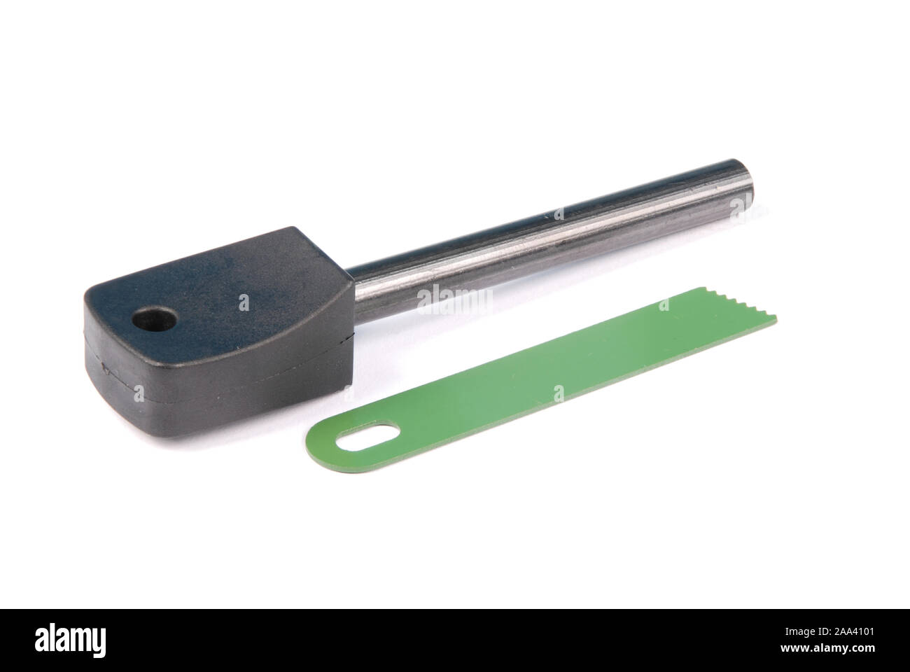 Flint fire steel and a brace, travel equipment, isolated on a white ...