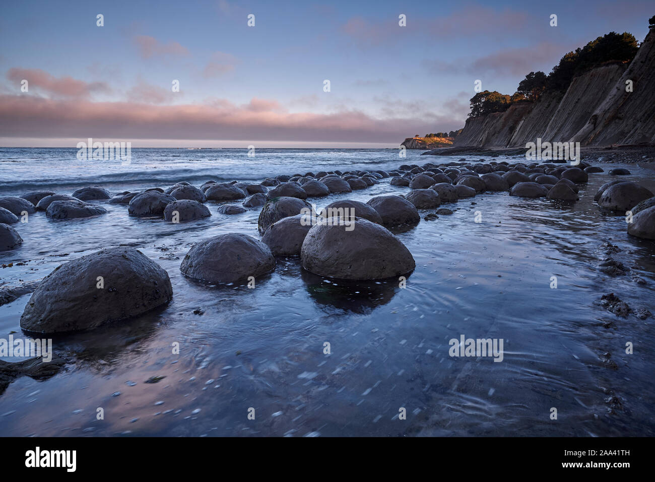 Rock formations in the Pacific Ocean at Bowling Ball Beach, California ...