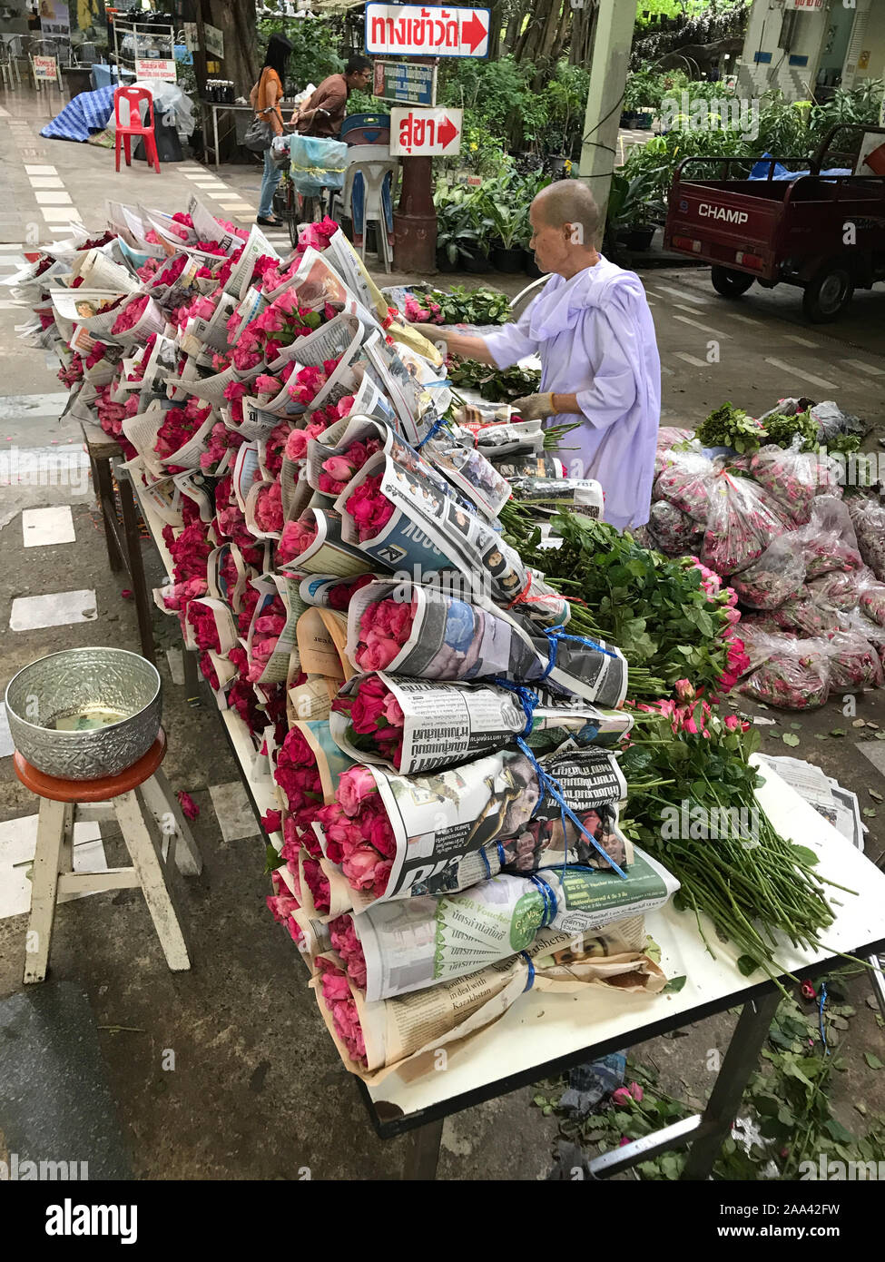 NOTHABURI, THAILAND, SEP 16 2019, A female Buddhist monk sells a ...