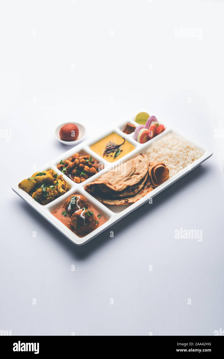 Indian vegetarian Food Thali or Parcel food-tray with compartments in ...
