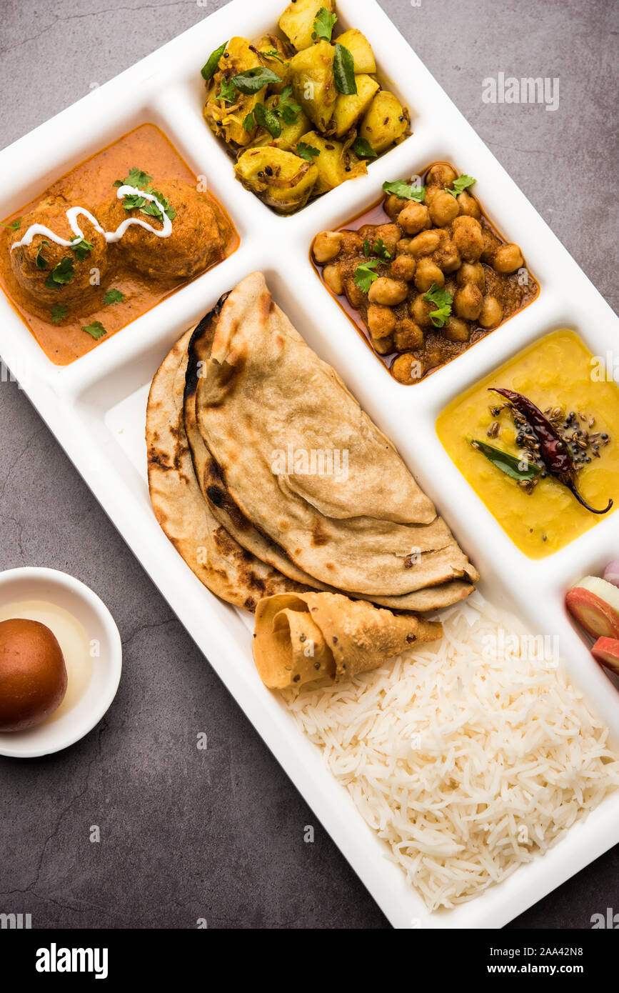 Indian vegetarian Food Thali or Parcel food-tray with compartments in ...