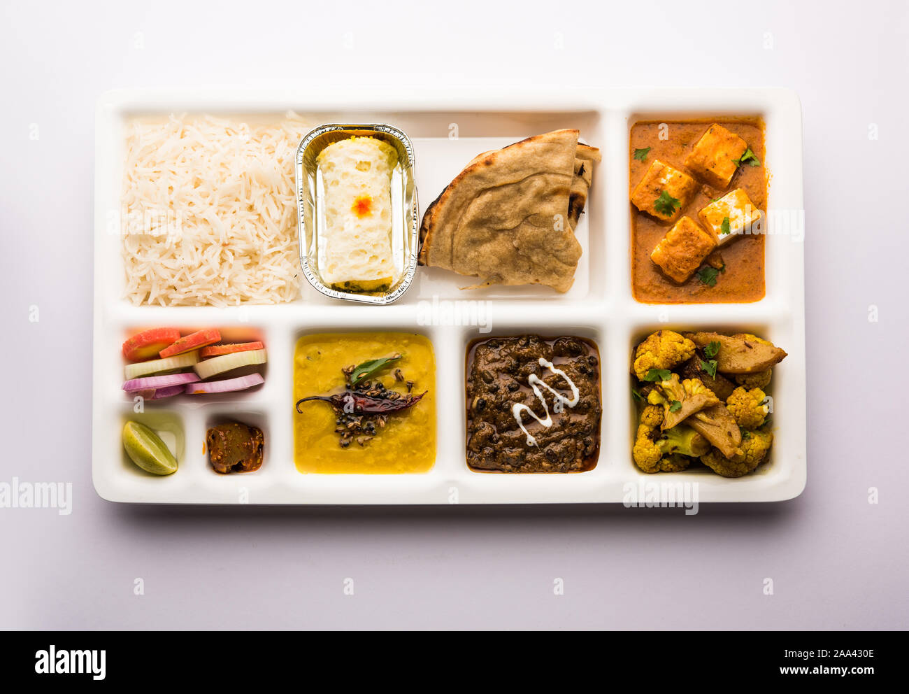 Indian vegaterian Food Thali or Parcel food-tray with compartments in ...