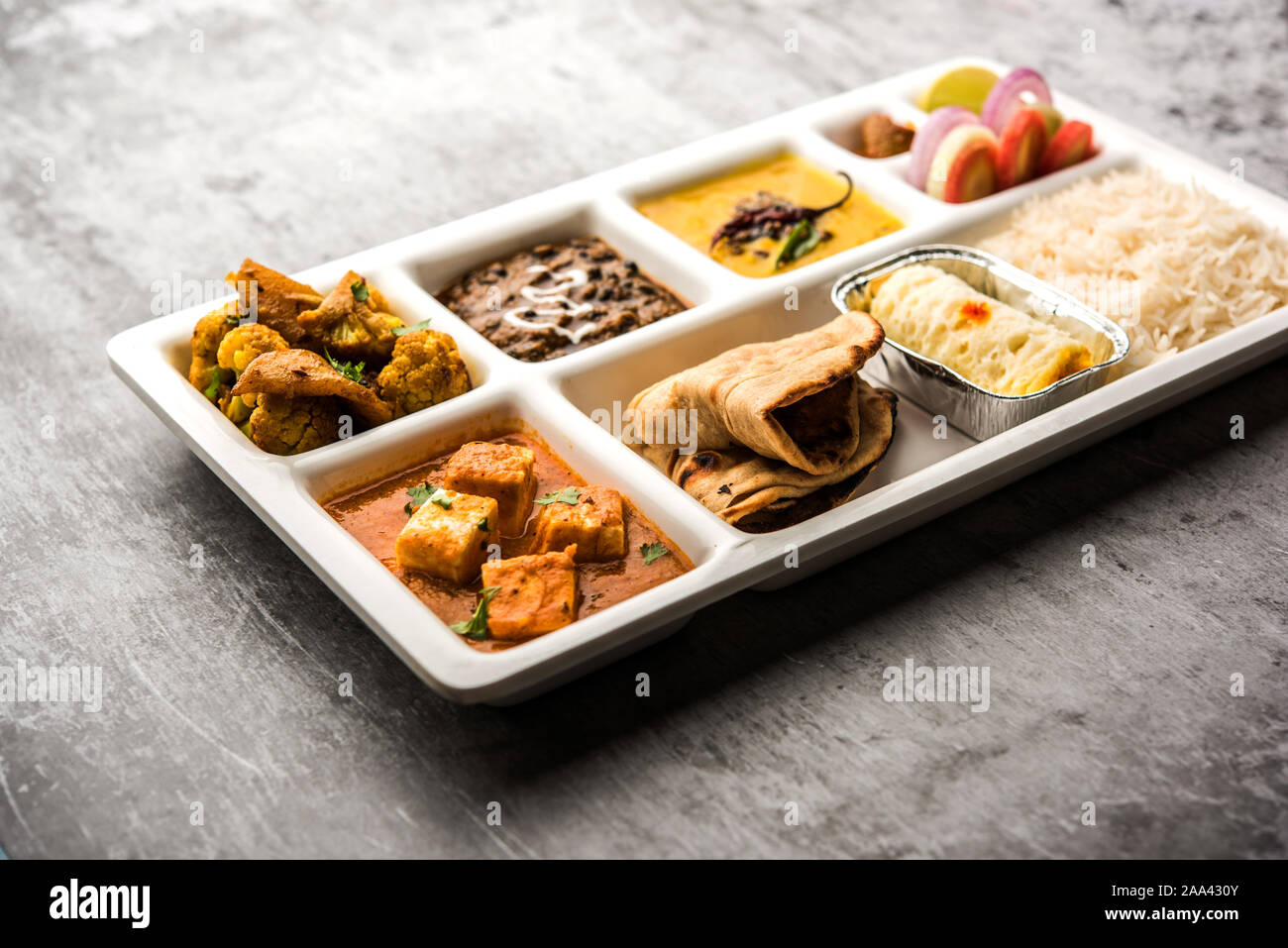 Indian vegaterian Food Thali or Parcel food-tray with compartments in ...